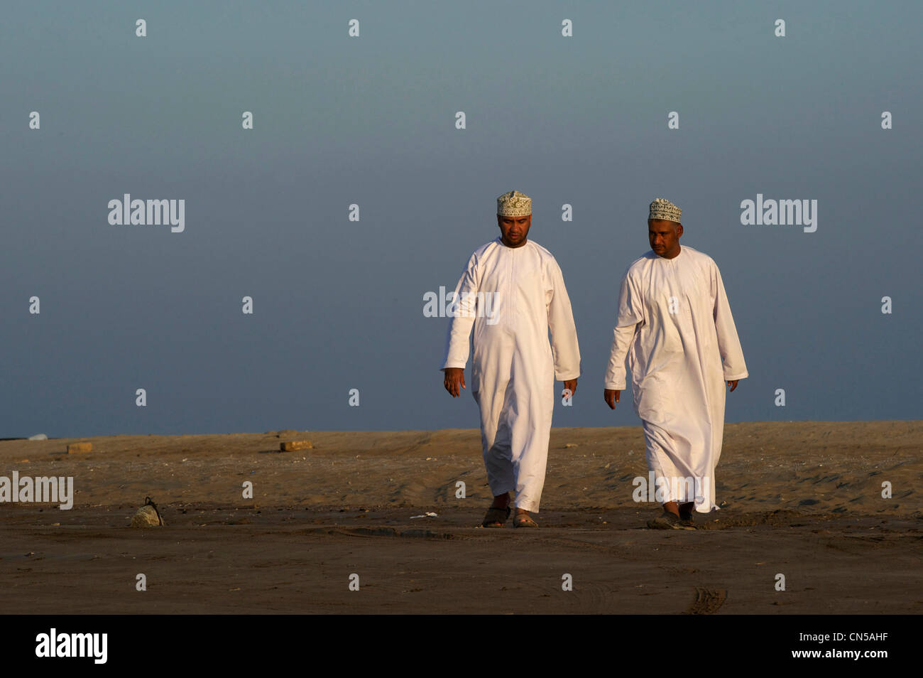 Sultanate of Oman, Al Batinah Region, Al Sawadi, the beach, men with ...
