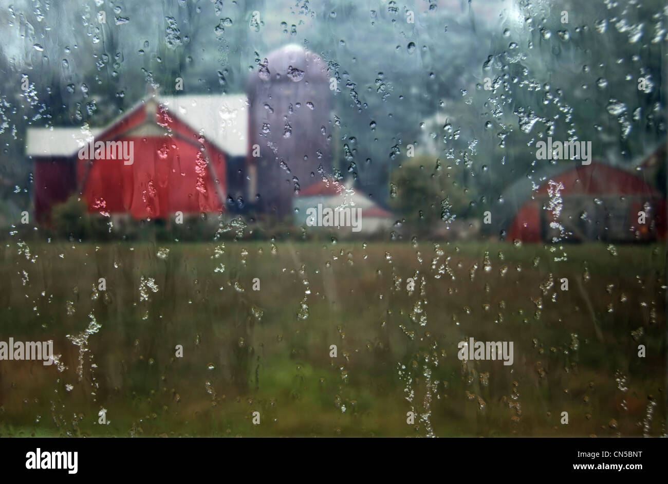 barn and silo through a rainy window Stock Photo - Alamy