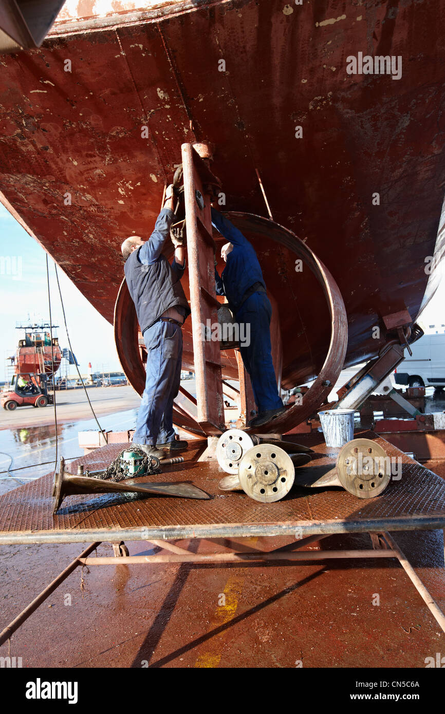 France, Finistere, Le Guilvinec, worker on trawler ashore Stock Photo ...