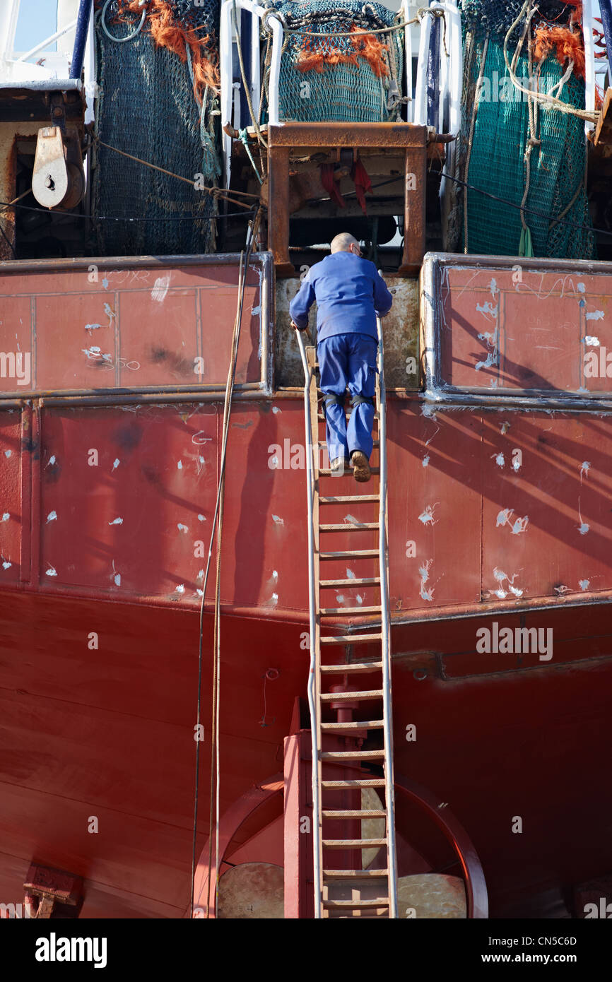 France, Finistere, Le Guilvinec, worker on trawler ashore Stock Photo ...