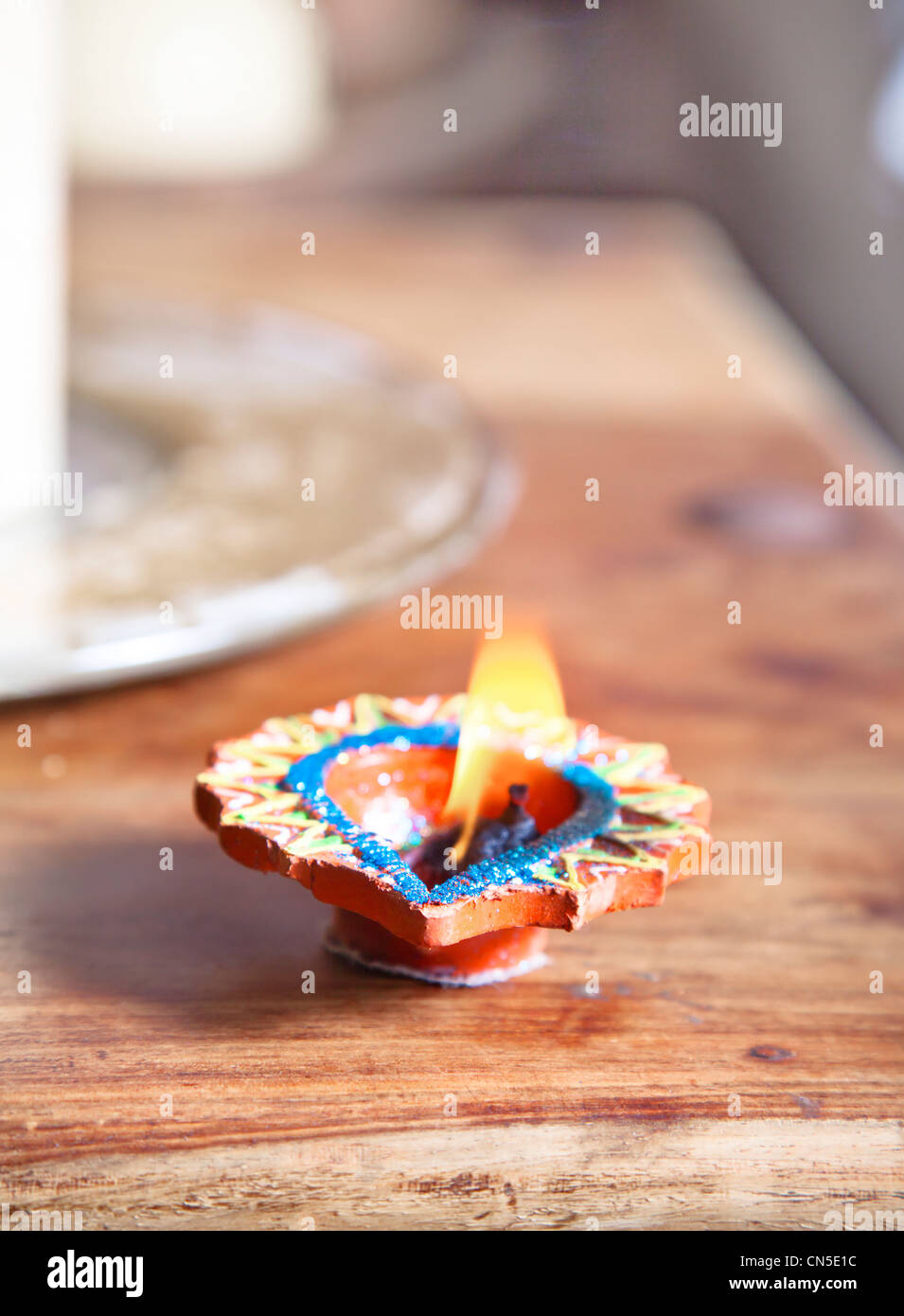 Verticalg portrait of Hindu candle diva, a daily ritual and in ...