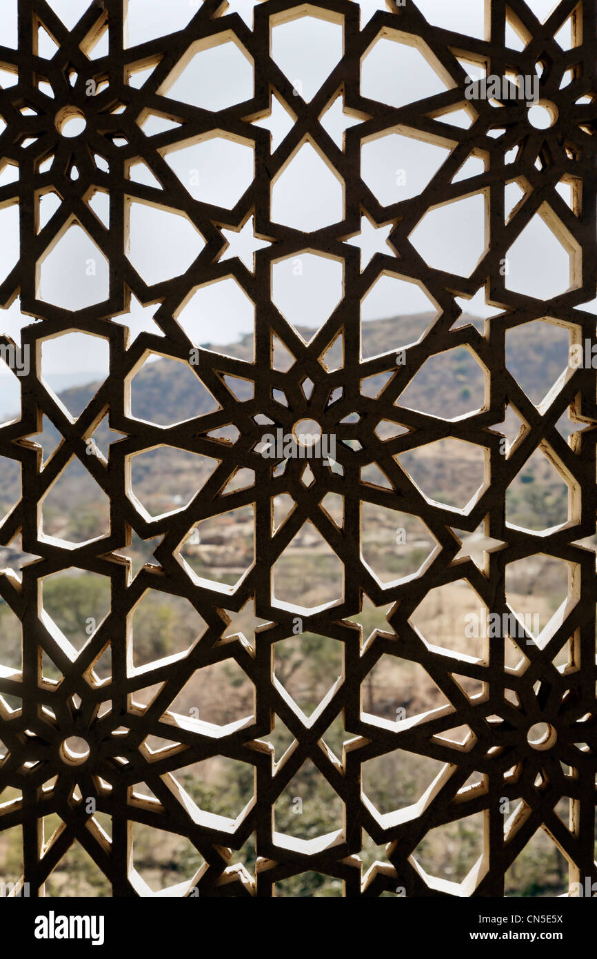 Indigenous concrete craftwork of Rajasthan India a window opening, grid ...