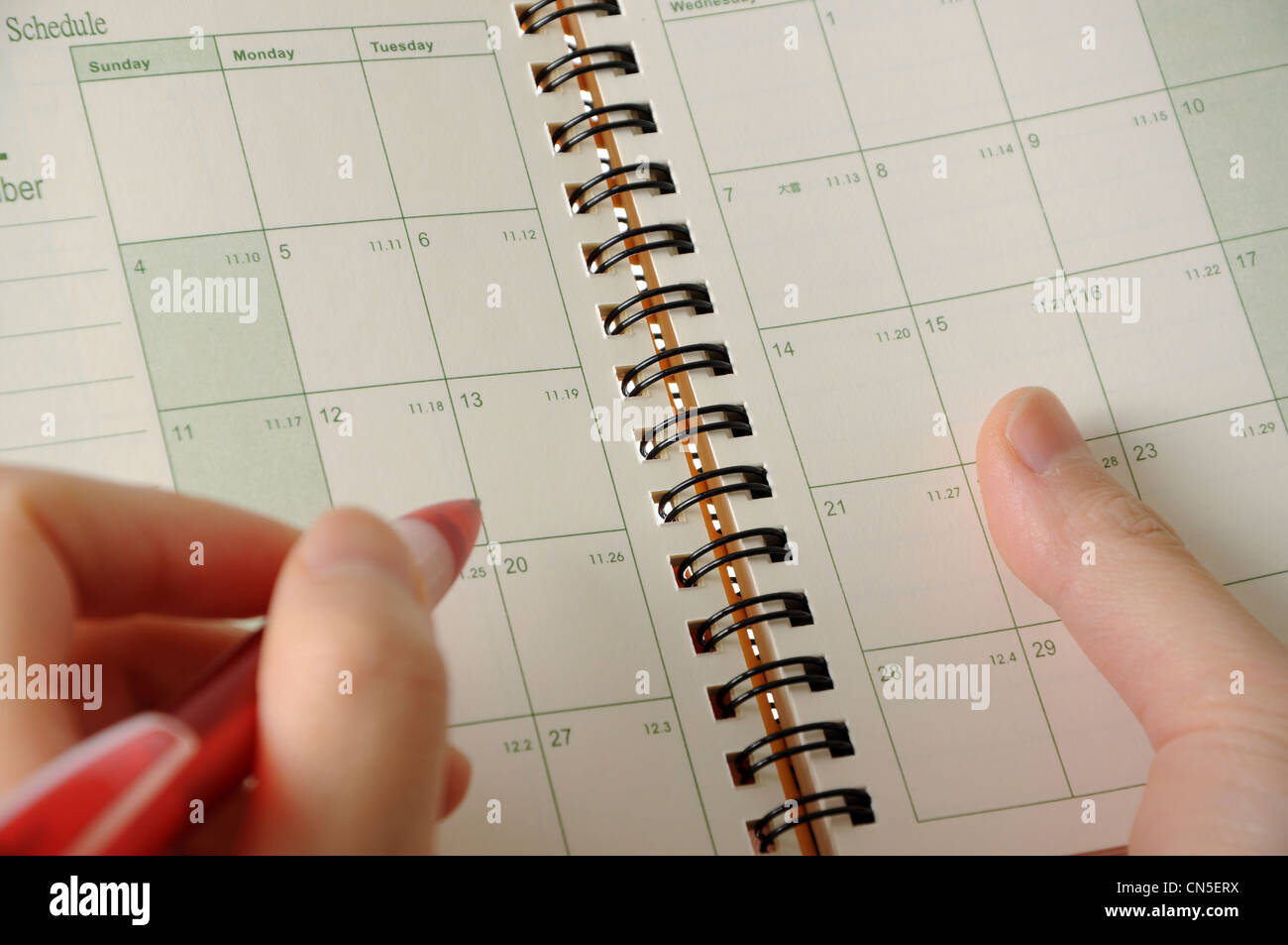 Business people check his schedule time Stock Photo - Alamy