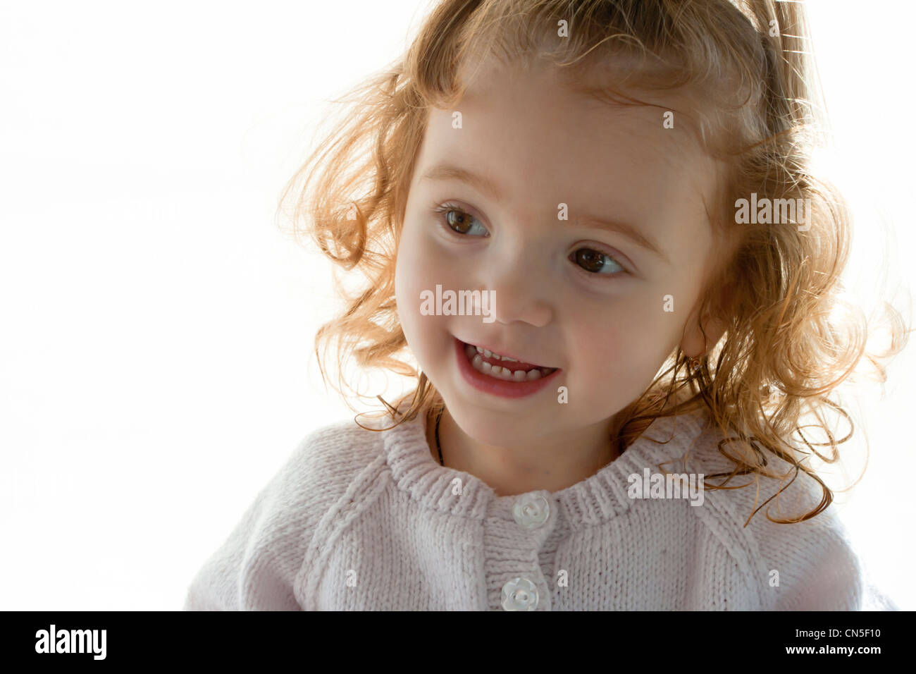Portrait of a young girl. Age 2 years. white background Stock Photo - Alamy