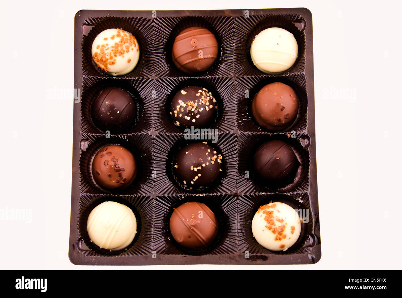 Pralines pack isolated on the white Stock Photo - Alamy