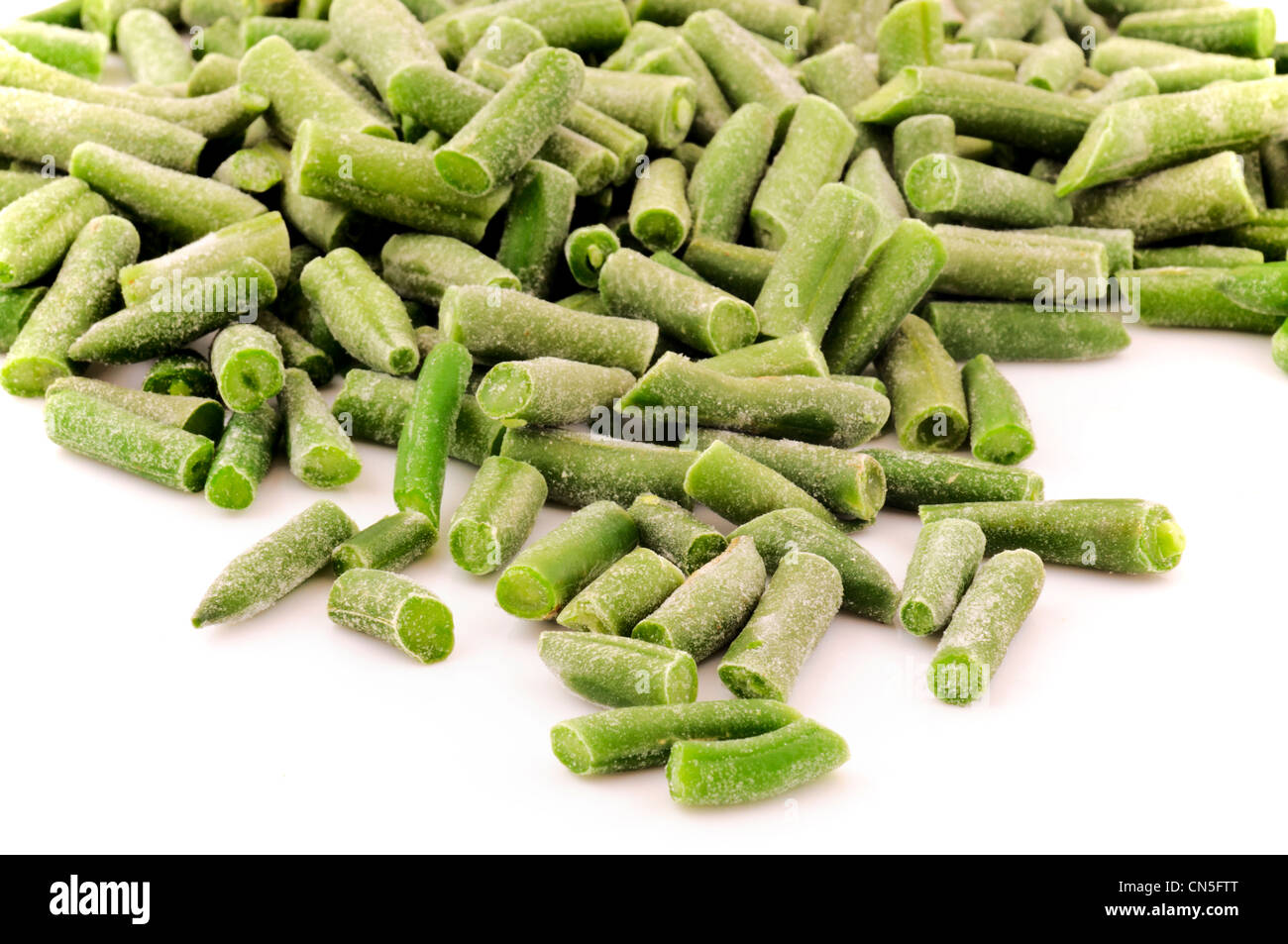 Green beans IQF isolated on white Stock Photo - Alamy
