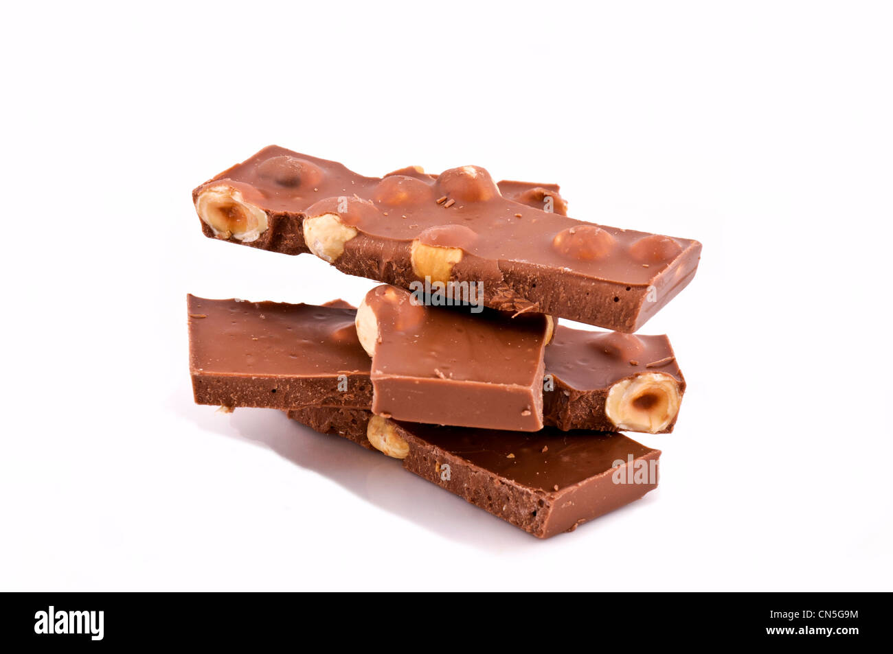 Broken chocolate blocks hazelnuts hi-res stock photography and images ...
