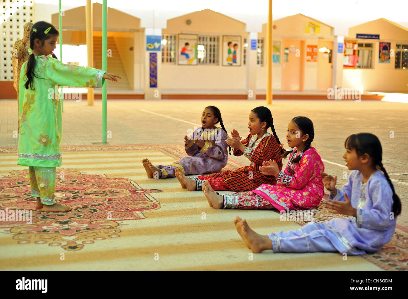 Sultanate of Oman, Muscat, view of female kids singing Stock Photo - Alamy