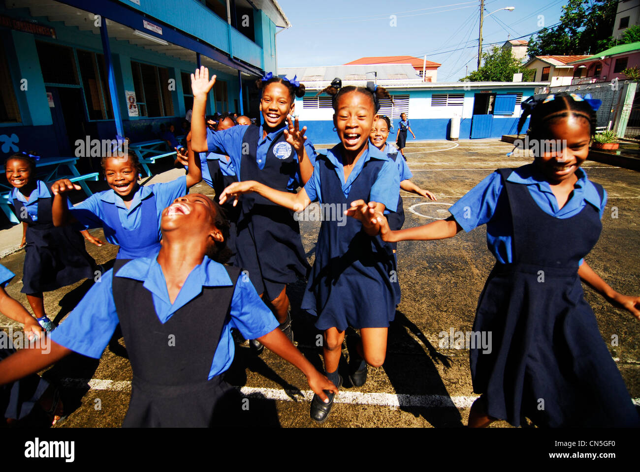 West Indies Caribbean, Saint Lucia, Canaries, group of girls running on ...
