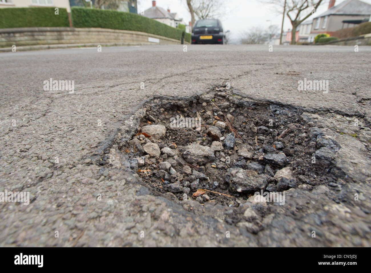 Pothole road hi-res stock photography and images - Alamy