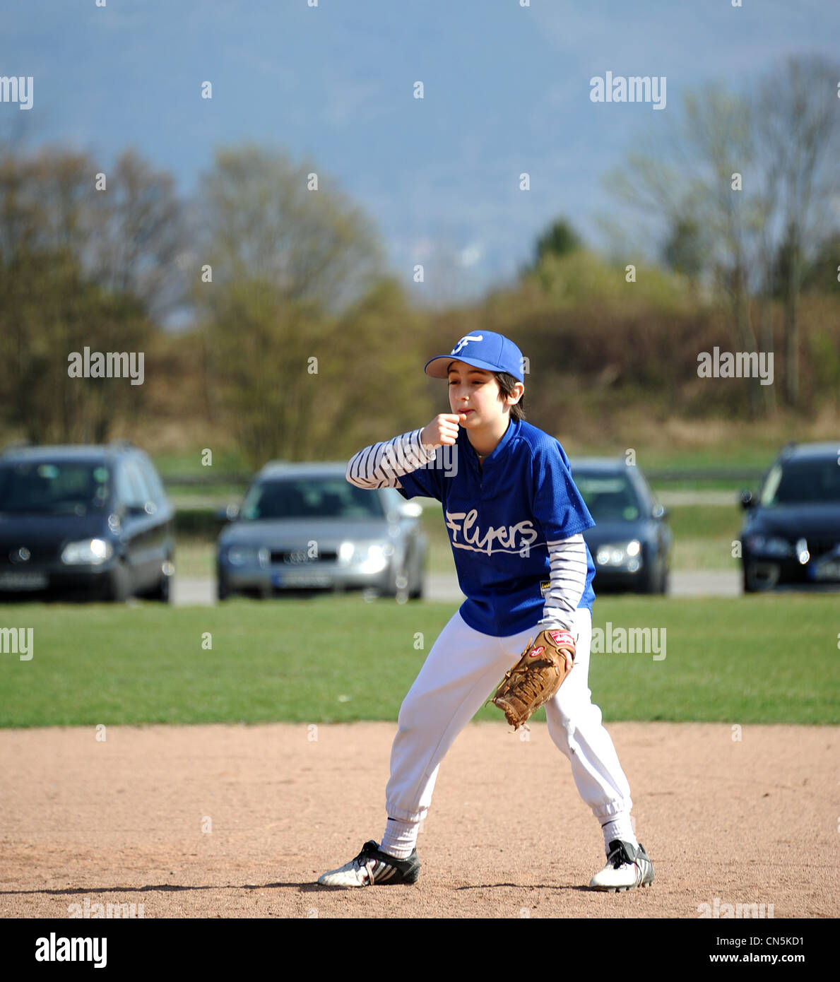 Schoolboy playing baseball Stock Photo - Alamy