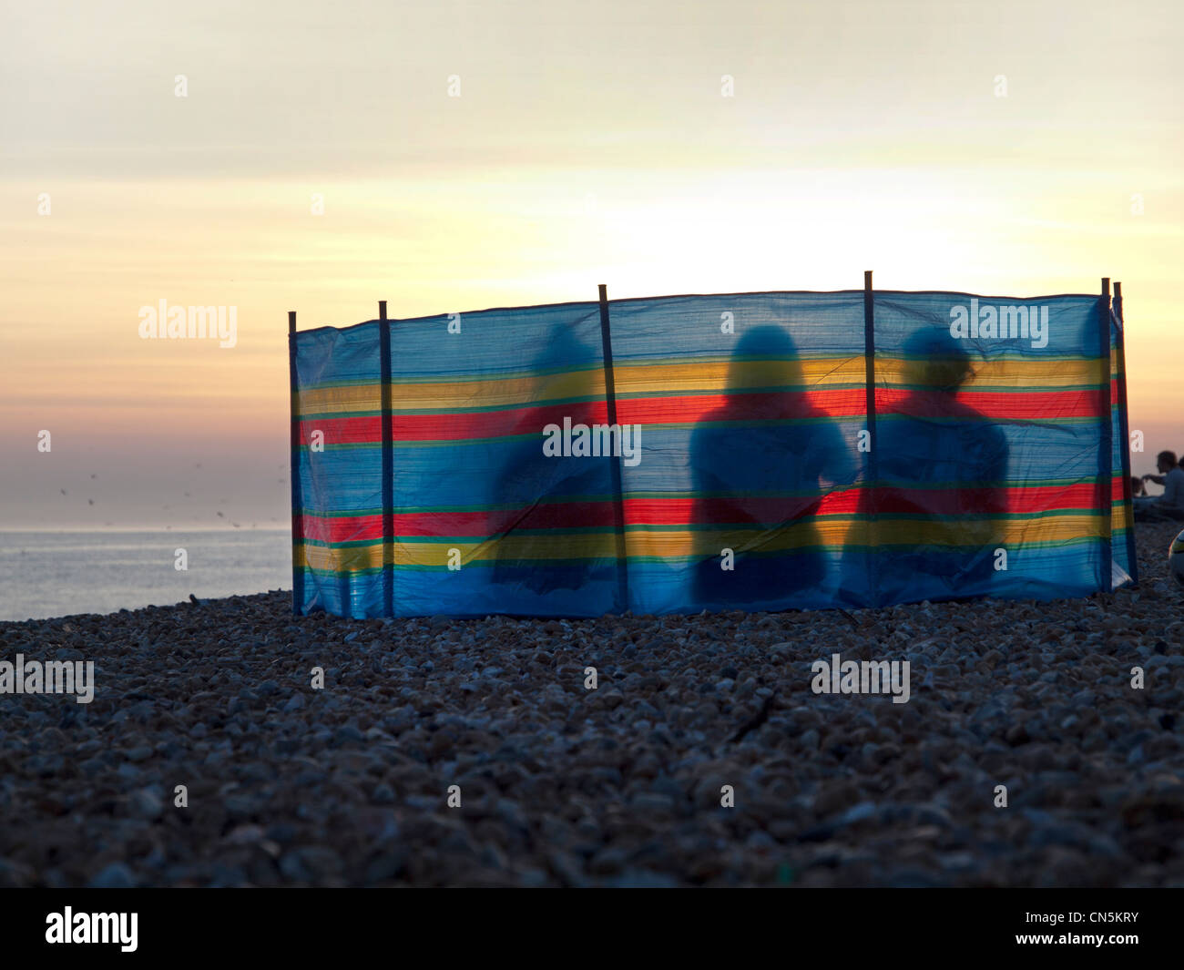 A wind-breaker at sunset Stock Photo - Alamy