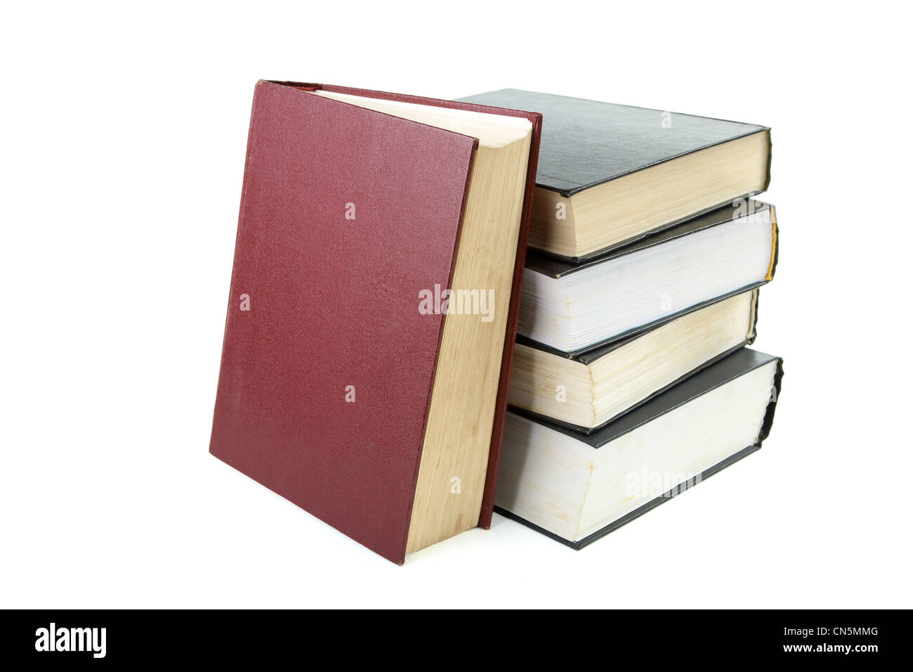 Old thick volumes isolated on a white background Stock Photo - Alamy