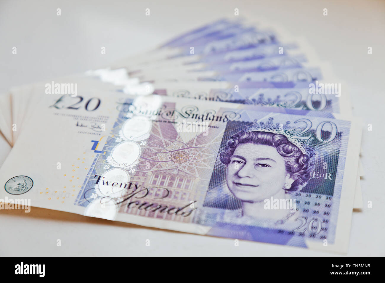 A set of 20 pound notes spread out Stock Photo - Alamy
