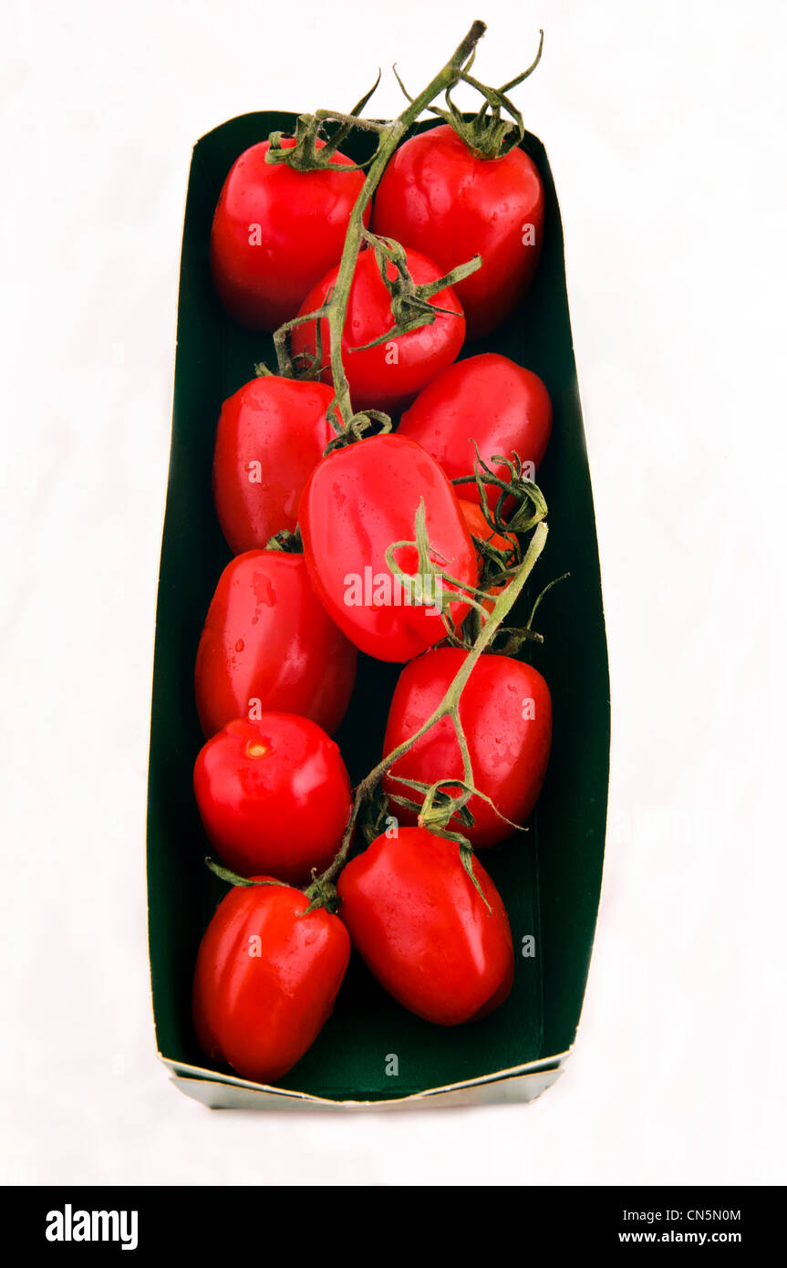 Pack of small tomatoes isolated on the white Stock Photo - Alamy