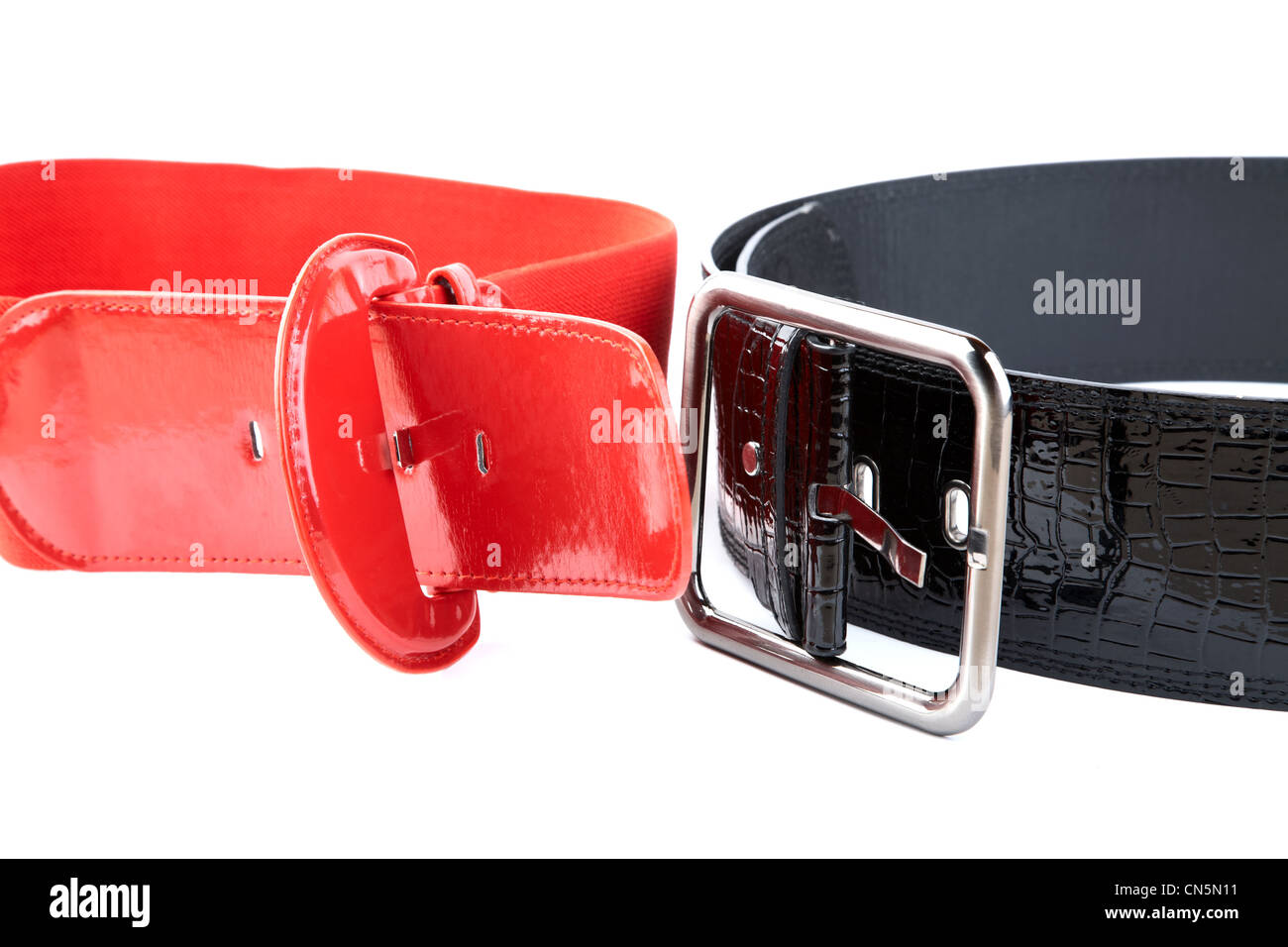 Black and red female belt on a white background Stock Photo - Alamy