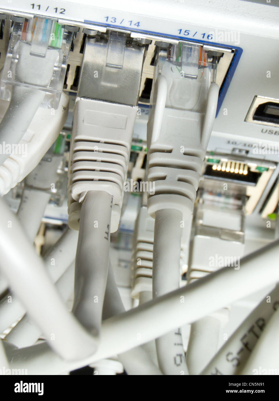 close up of network cables connected to switch Stock Photo - Alamy