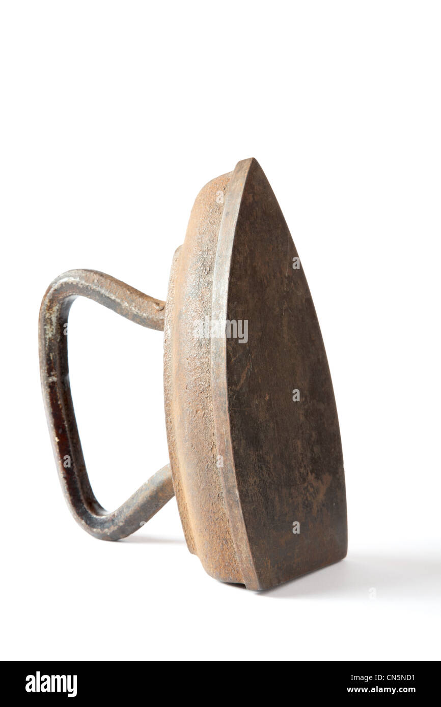 The old iron covered with rust on a white background Stock Photo - Alamy