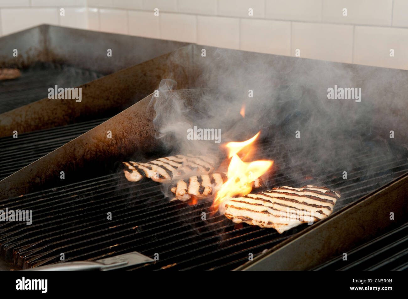 Flaming grill hi-res stock photography and images - Alamy