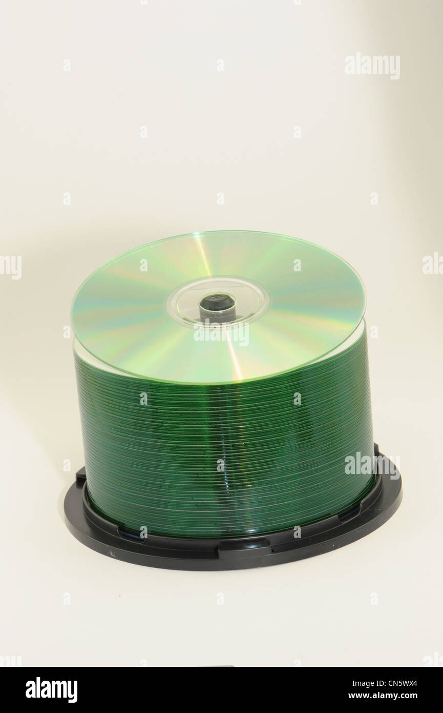 compact discs in stack green shiny taken on a white background Stock ...