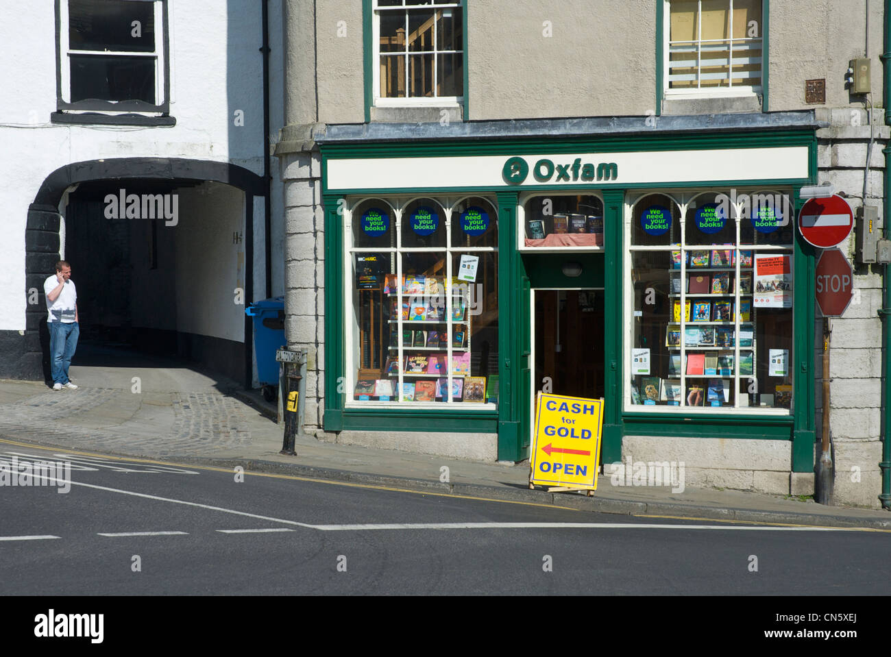 Oxfam shop in Ulverston, Cumbria, with sign reading cash for gold Stock ...