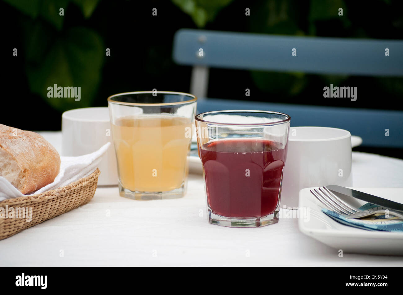Breakfast table set up outside Stock Photo - Alamy