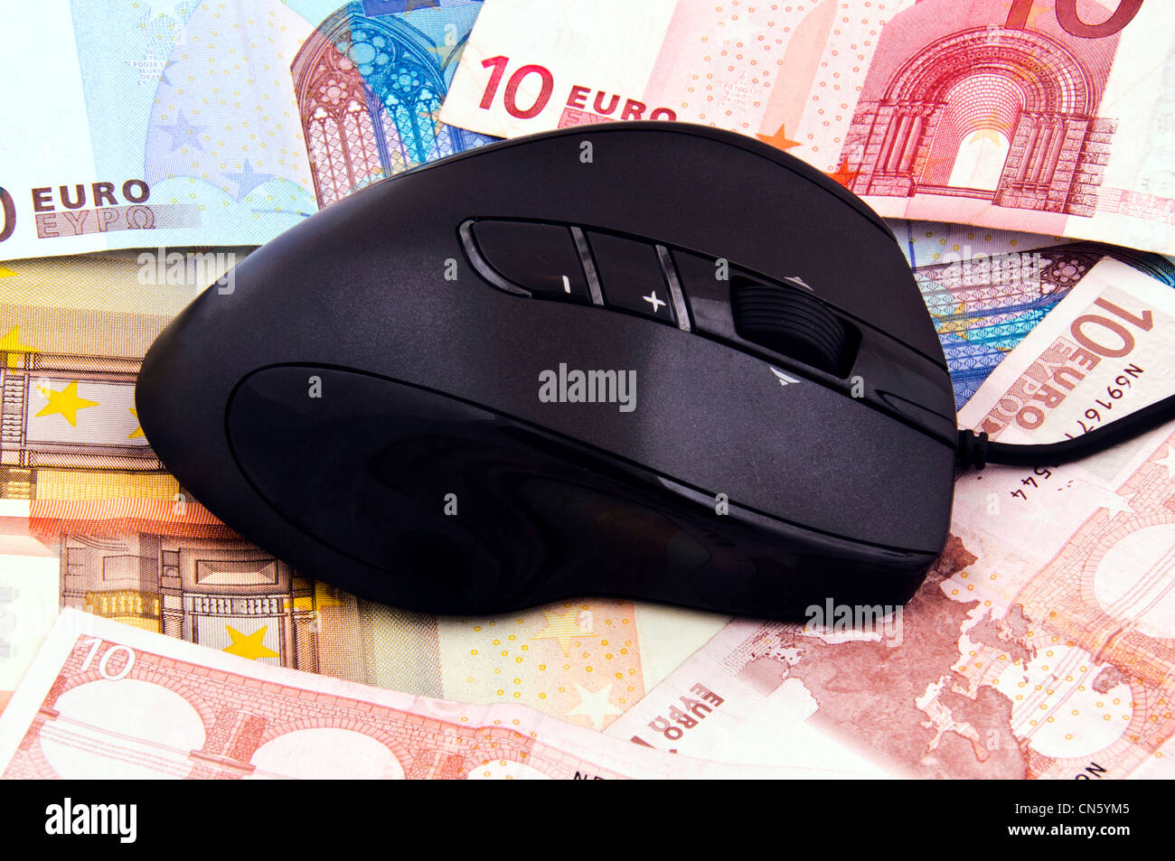 Mouse and money together banking Stock Photo - Alamy