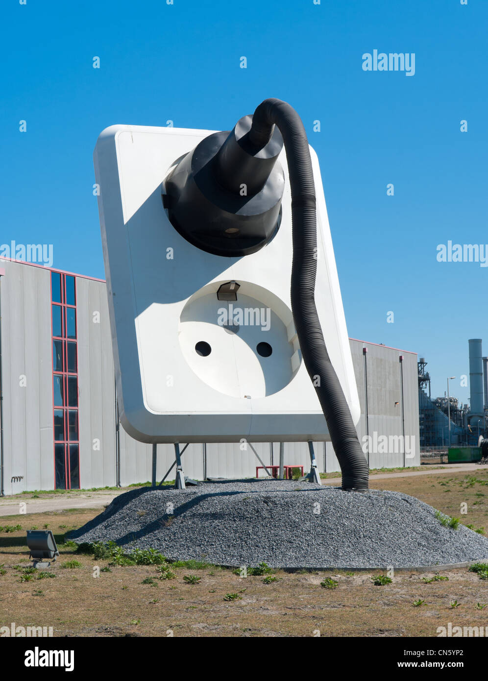 giant outlet in front of a power station Stock Photo - Alamy