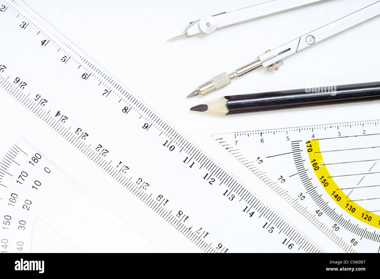 Scheme with compasses rulers and pencil. Close-up photo Stock Photo - Alamy