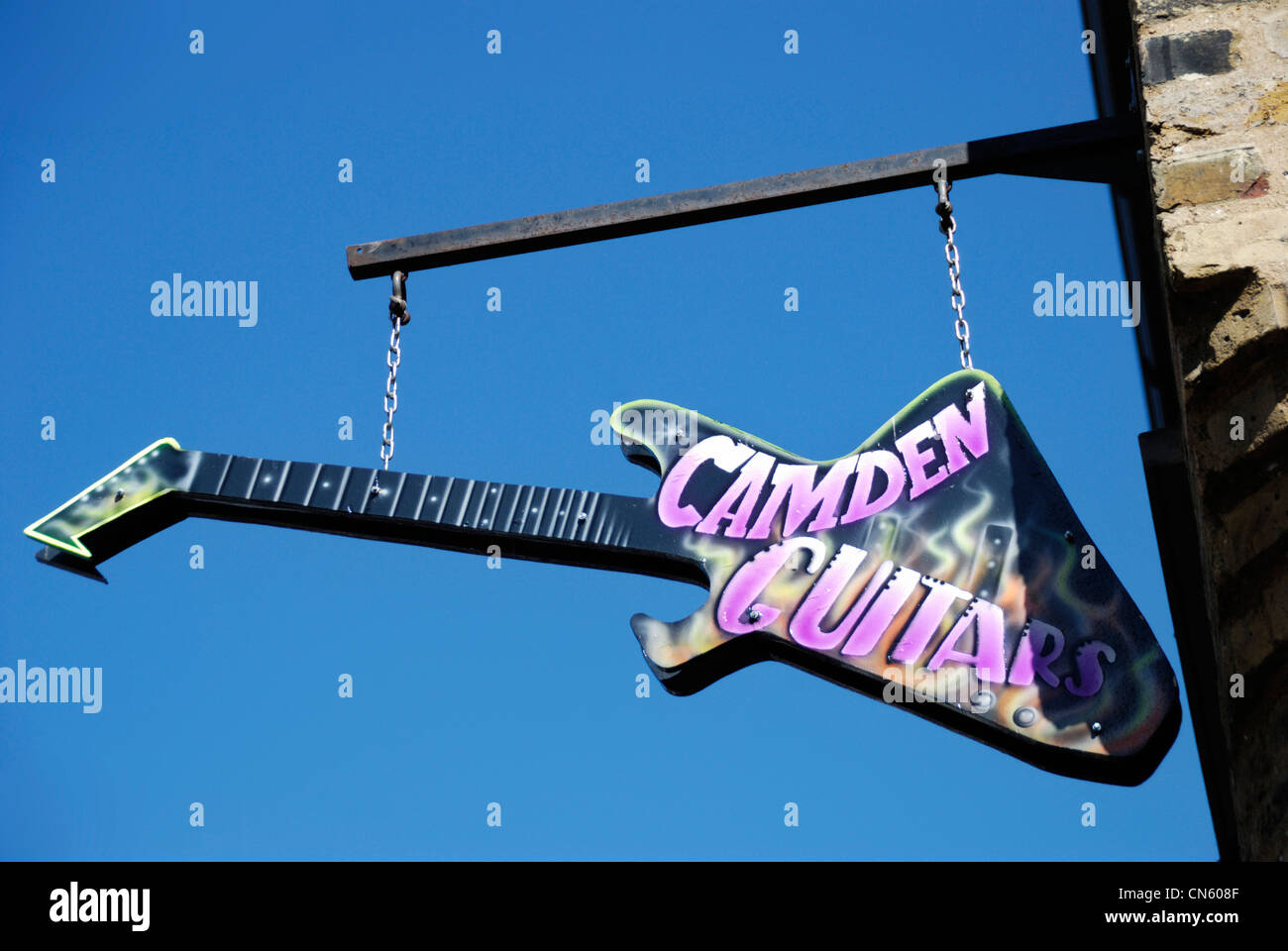 Camden Guitars ‘ sign in the form of an electric guitar above a shop in ...