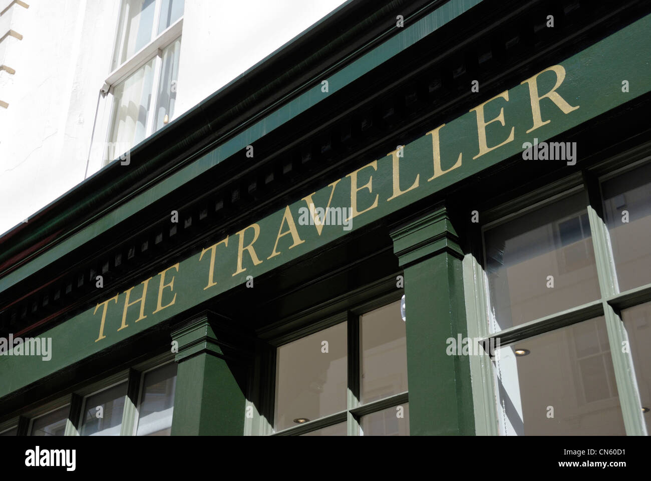 The Traveller ‘ sign above a shop Stock Photo - Alamy