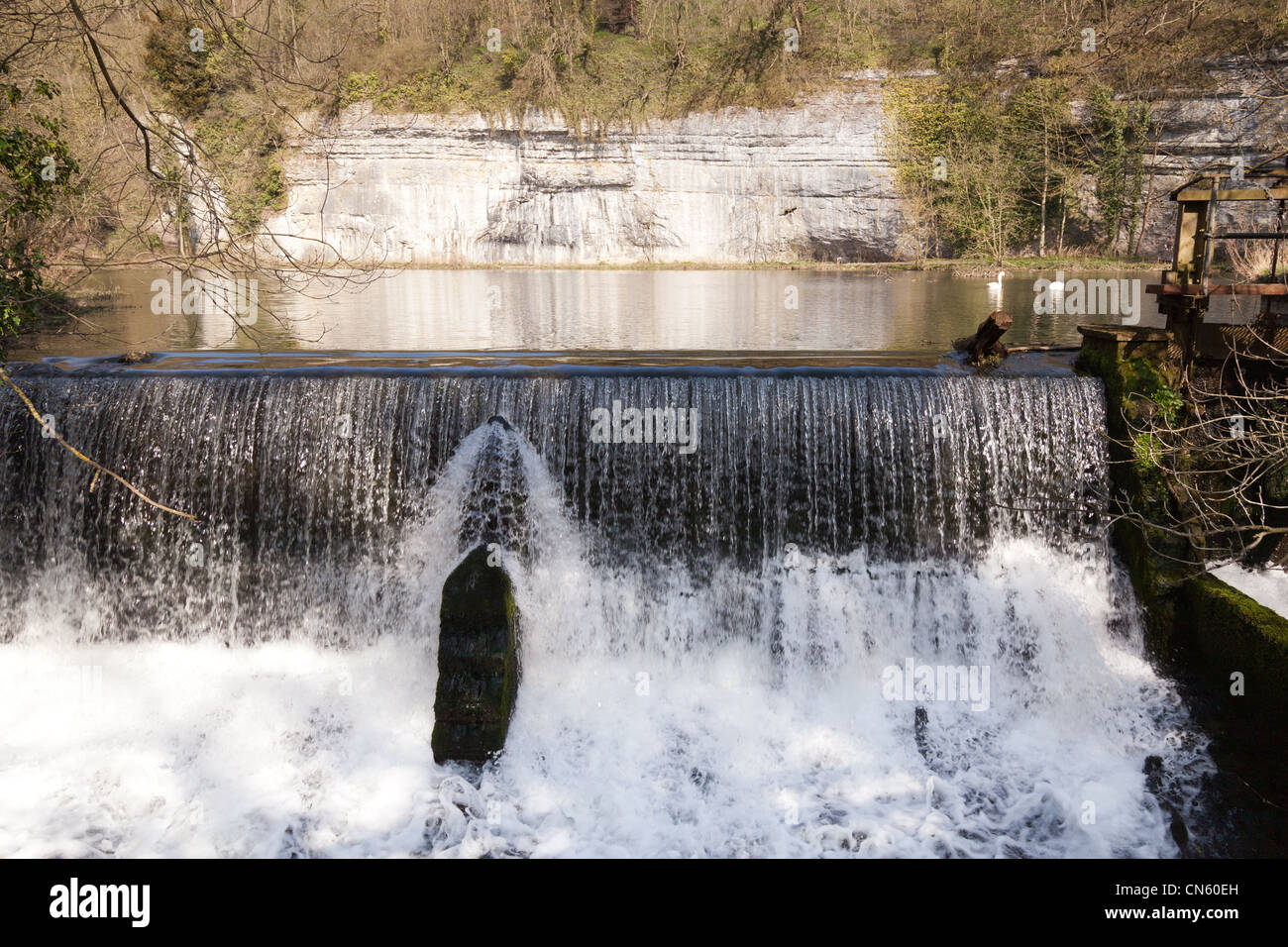 The weir,pool and crag at Water Cum Jolly on the river Wye at ...