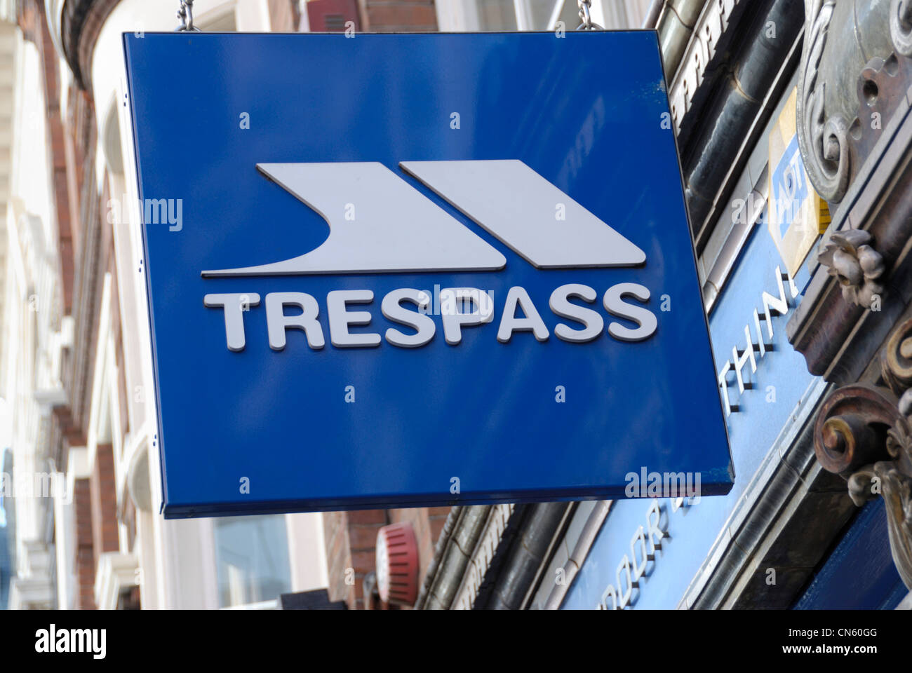 Trespass outdoor clothing shop sign logo Stock Photo - Alamy