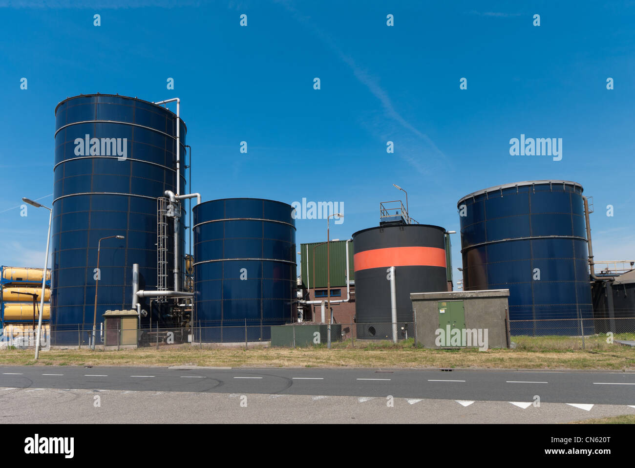 dark blue storage containers for bulk liquids Stock Photo - Alamy