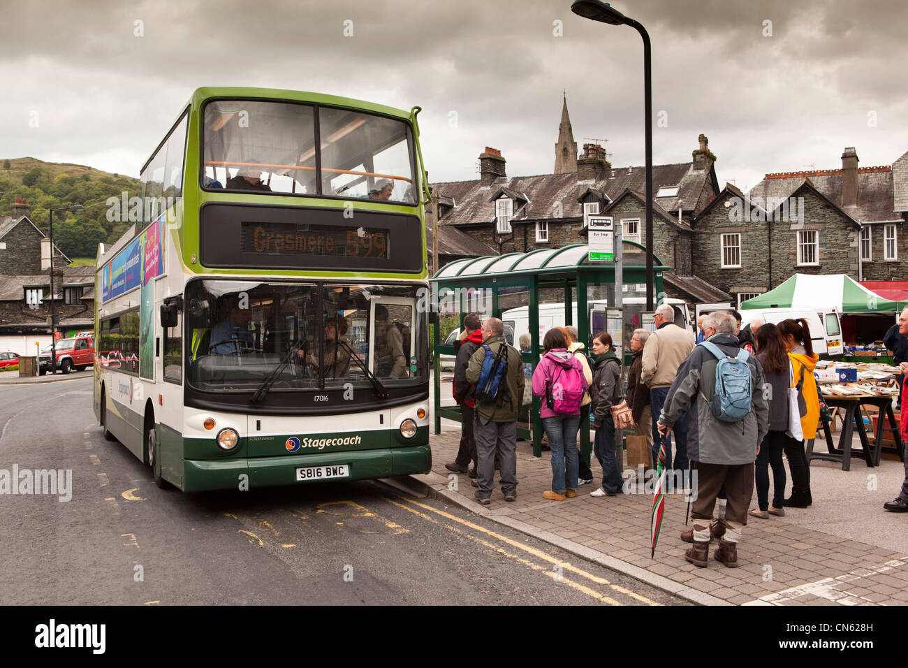 UK, Cumbria, Ambleside, King Street, passengers boarding Stagecoach ...
