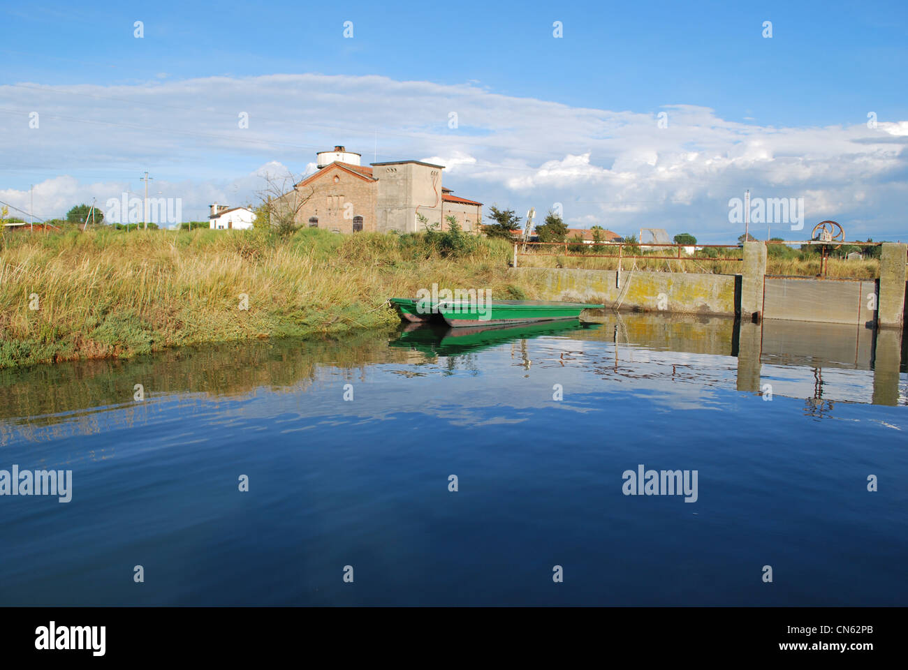 Landscape with farm house and canal, Cervia, Ravenna, Italy Stock Photo ...
