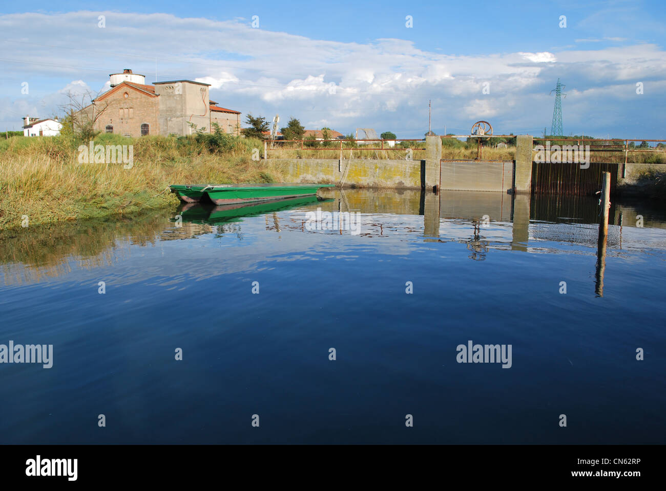 Landscape with farm house and canal, Cervia, Ravenna, Italy Stock Photo ...