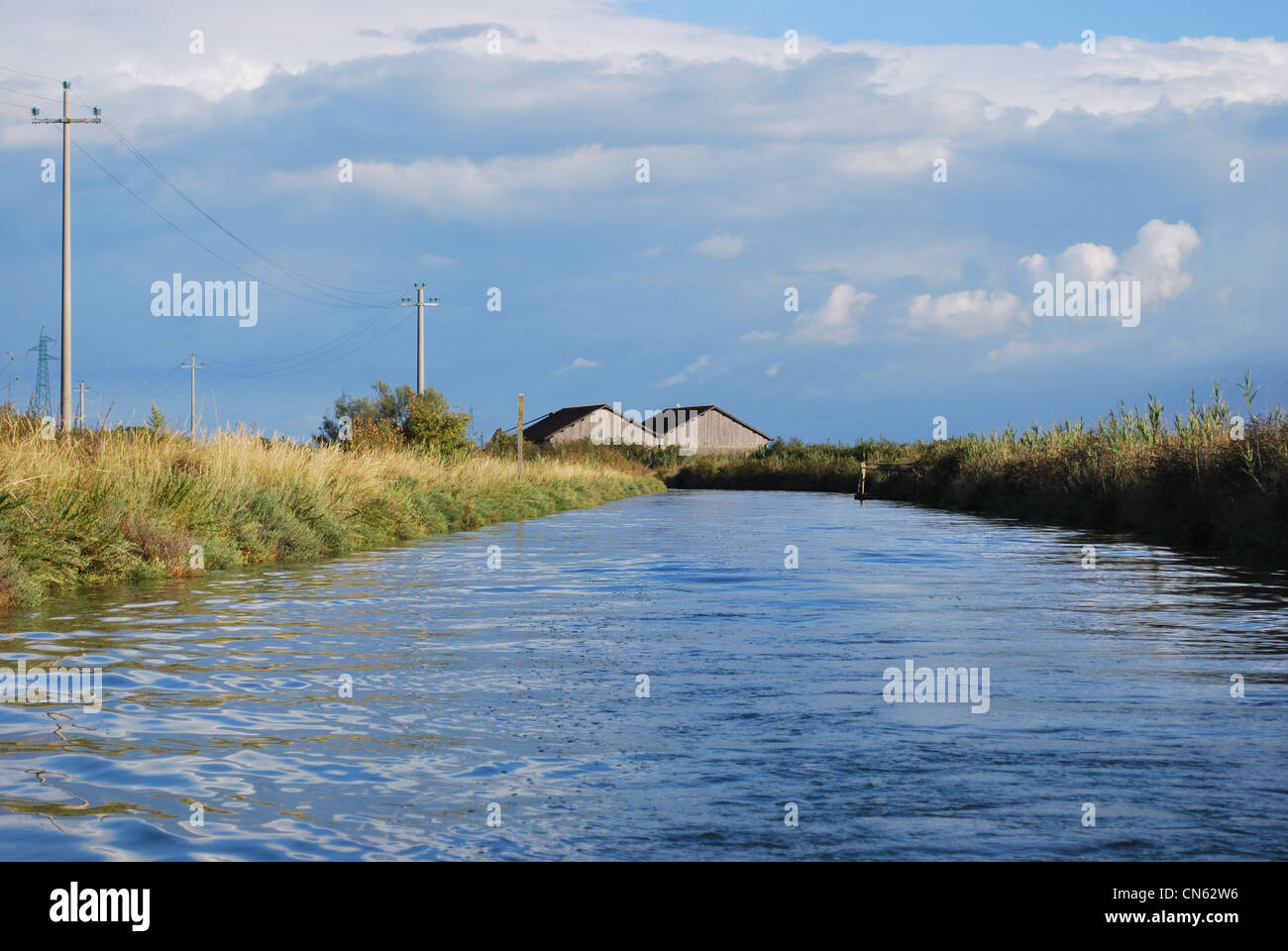 Landscape with farm house and canal, Cervia, Ravenna, Italy Stock Photo ...