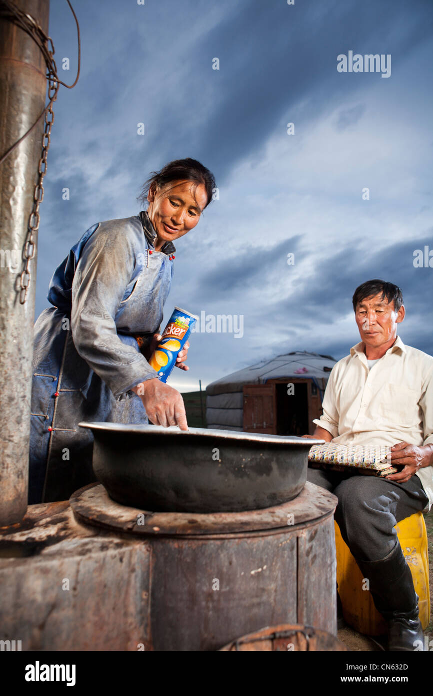 Mongolian woman cooking outside kitchen , Mongolia Stock Photo - Alamy