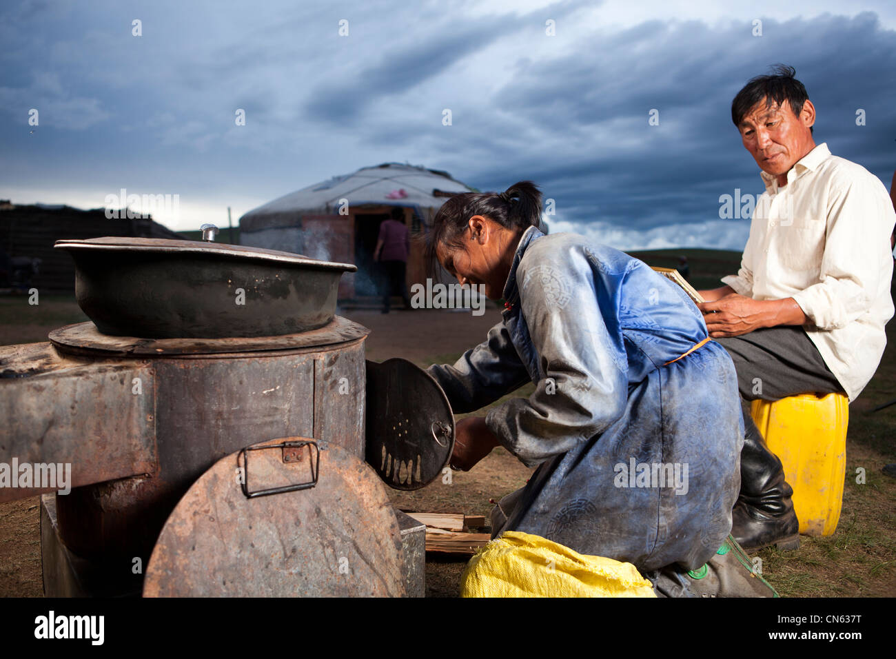 Mongolian woman cooking outside kitchen , Mongolia Stock Photo - Alamy