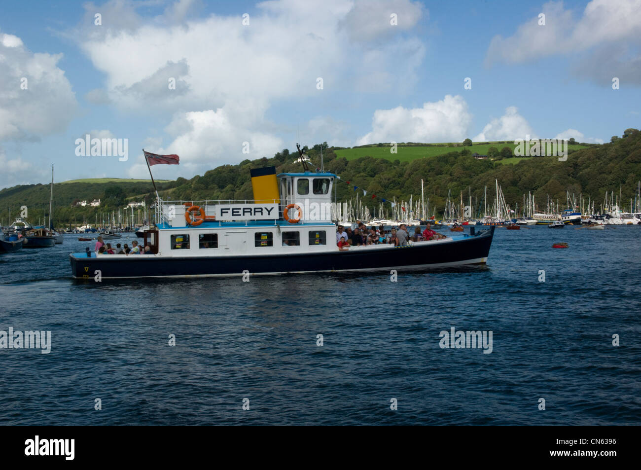 The Dartmouth to Kingswear passenger ferry crosses the River Dart with ...