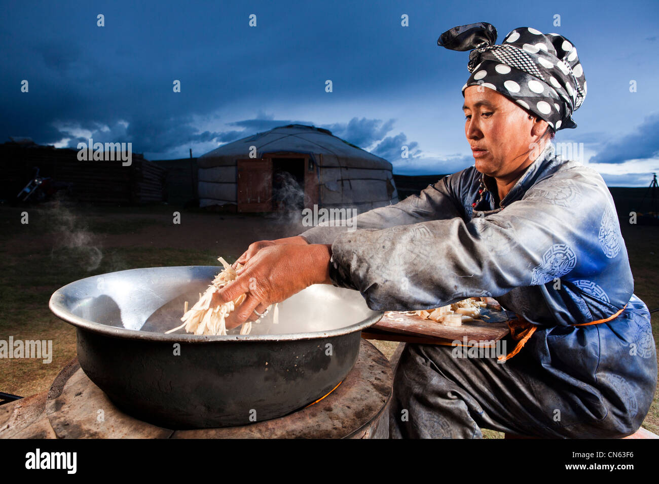 Mongolian woman cooking outside kitchen , Mongolia Stock Photo - Alamy