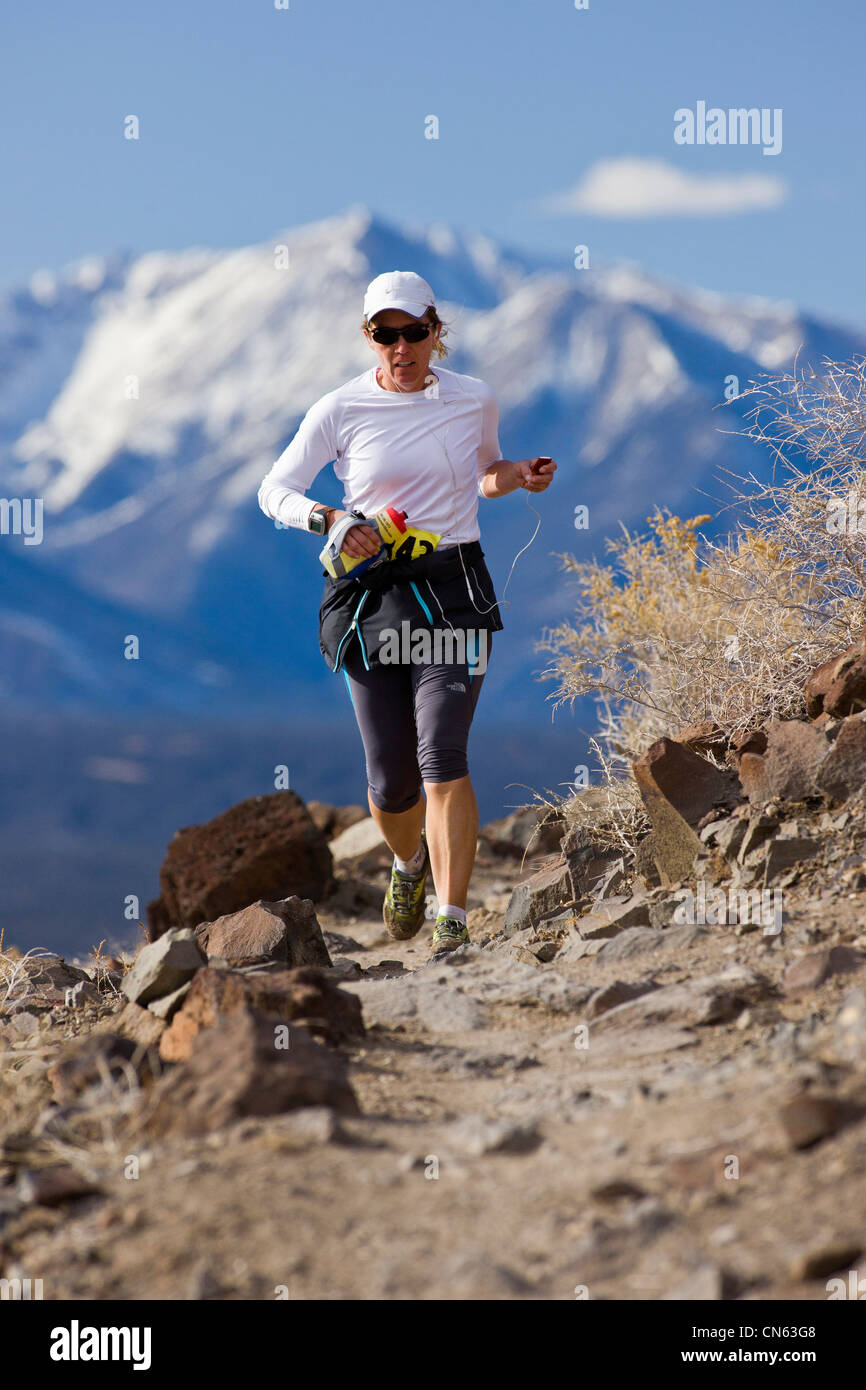 Female runner competes in the Run Through Time Marathon, Salida ...
