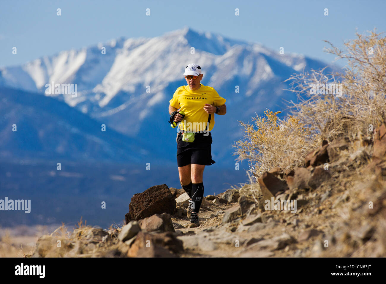 Male runner competes in the Run Through Time Marathon, Salida, Colorado ...