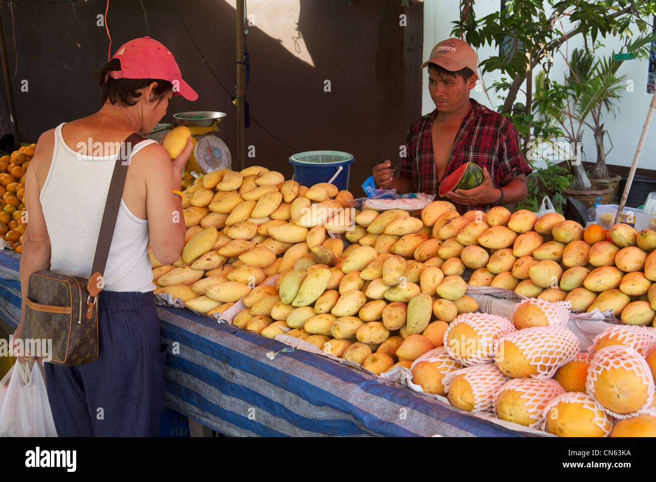A fruit stall selling Mangos in a market, Phuket, Thailand Stock Photo ...
