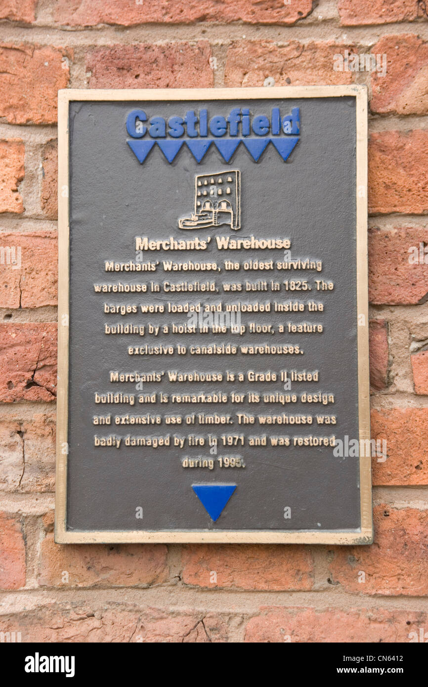 Merchant's warehouse plaque in Castlefield, Manchester Stock Photo - Alamy