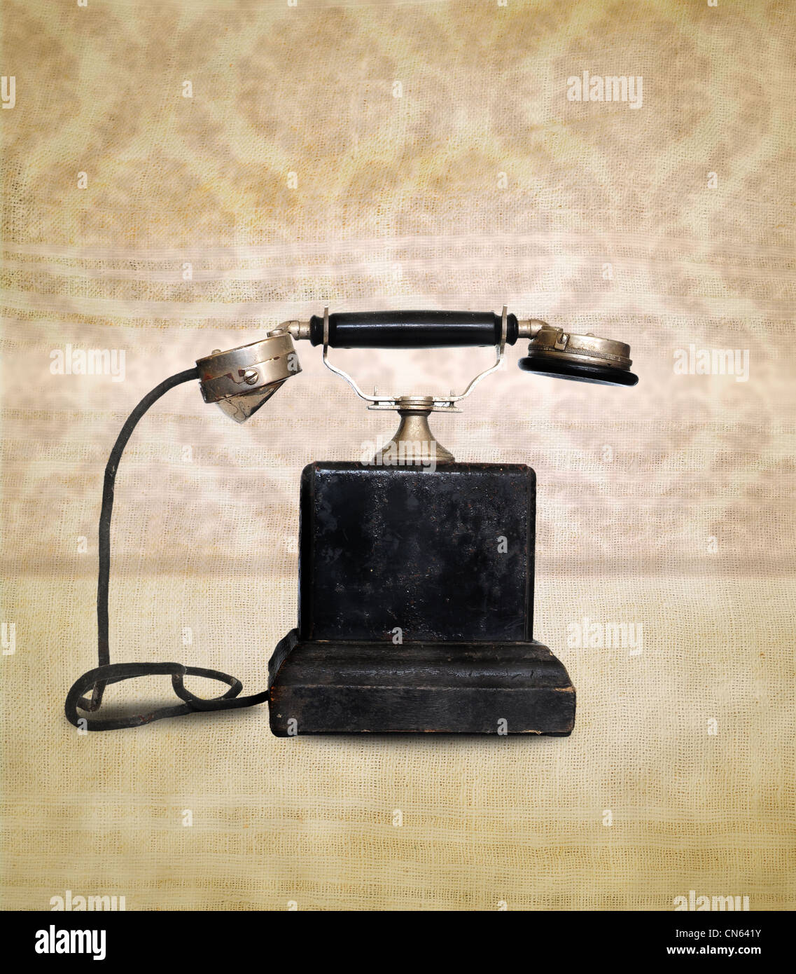 Vintage telephone on retro background Stock Photo - Alamy