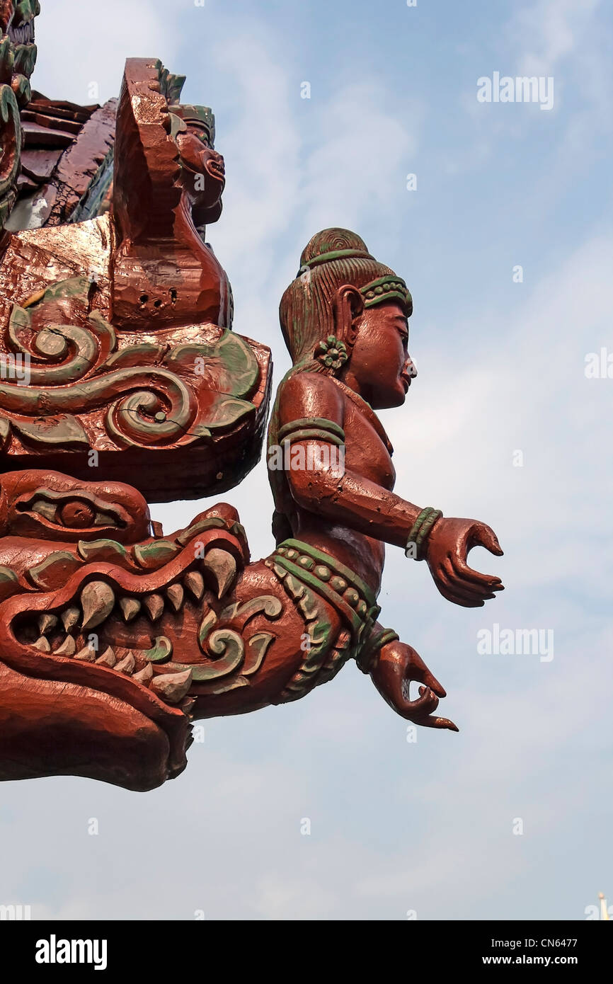 The red angel of buddha on clear sky Stock Photo - Alamy
