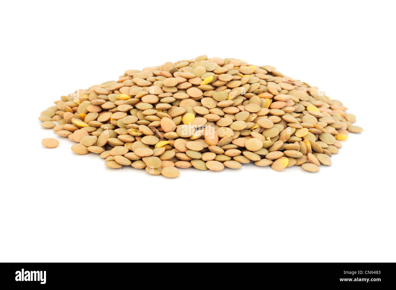 Pile of uncooked lentils isolated on white Stock Photo - Alamy