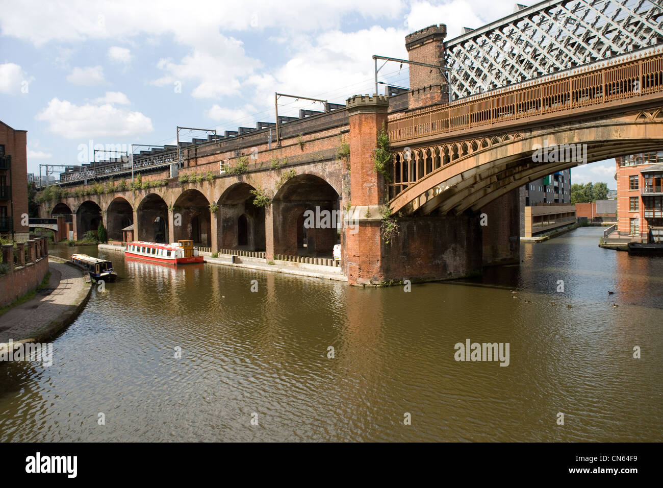 Railway bridge and canal in Castlefield, Manchester Stock Photo - Alamy